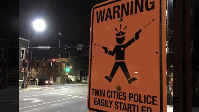 Fake street signs warning of 'easily startled police' appear after cop ...